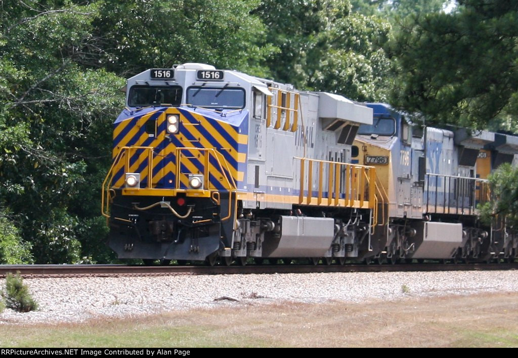 CREX ES44AC 1516 leads CSX C40-8Ws 7796 and 7906